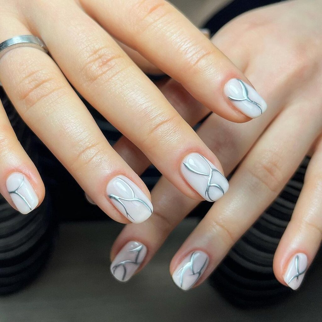 Minimalist Nails Featuring Neutral Colors and Simple Designs